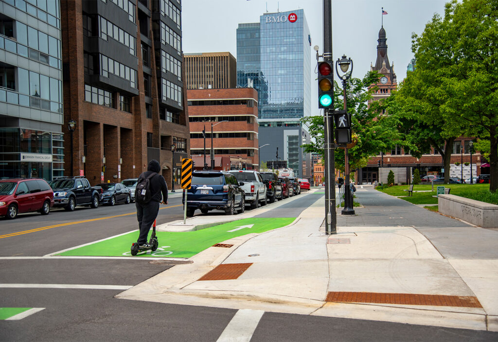 Travel Downtown Milwaukee’s Wells Street with Any Transportation Mode ...